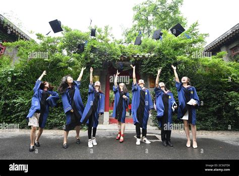 Beijing July Xinhua Graduates Throw Their