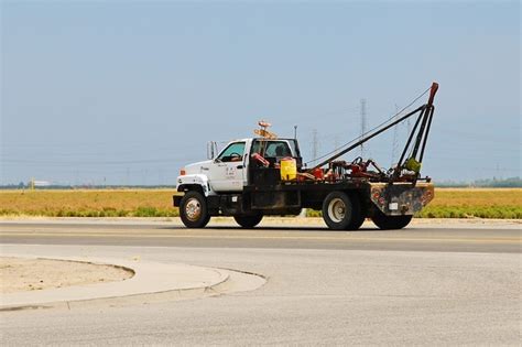 Flatbed Towing Vs Dolly Towing