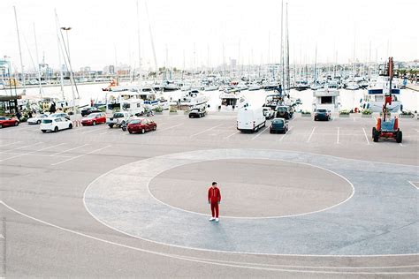 Sportive Man On Parking Lot By Stocksy Contributor Javier Díez