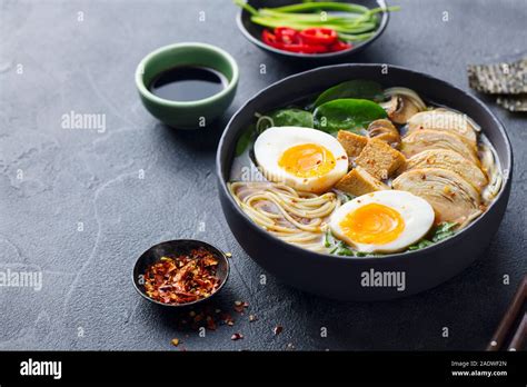 Asian Noodle Soup Ramen With Chicken Tofu Vegetables And Egg In