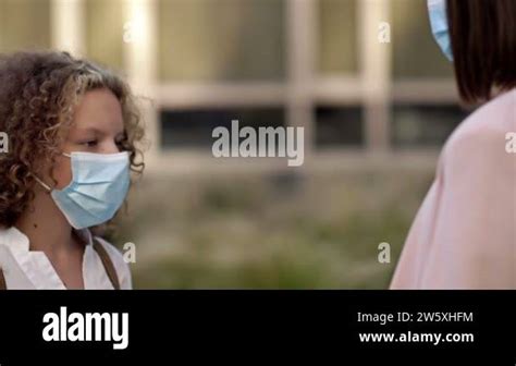 Teacher Woman Measures School Girl Temperature With Digital Thermometer Stock Video Footage Alamy