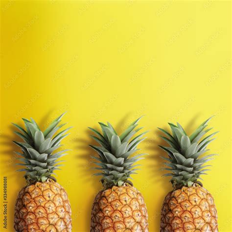 Pinapple On Pastel Yellow Background Exotic Fruits Background Stock
