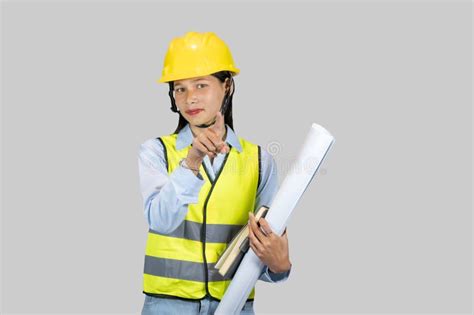 Female Asian Construction Engineer With Chartboard And Notebook Gives