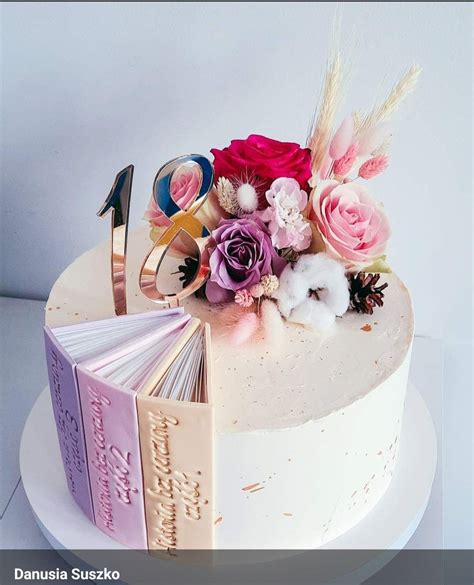 Pretty Birthday Cake With Book And Flower Decorations