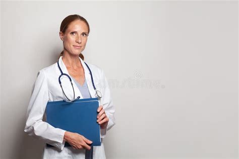Confident Diverse And Empowered Doctor Ready For Work Indoor Stock