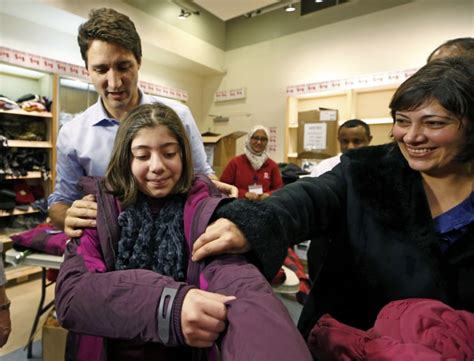 Canada Welcomes First Plane Of Syrian Refugees