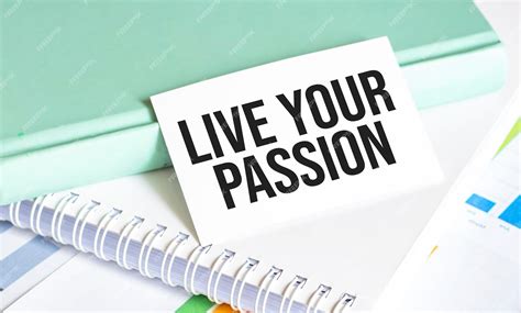 Premium Photo Live Your Passion Text On Notepad And Charts