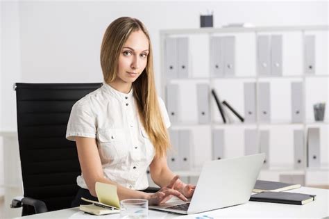 Premium Photo Female Using Laptop