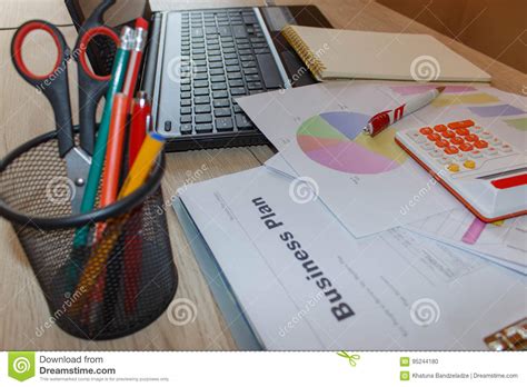 Office Workplace With Pen Notebook Calculator And Computer Laptop On