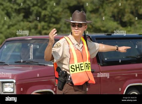 White Southern Sheriff From Fulton County In Georgia Directing Traffic