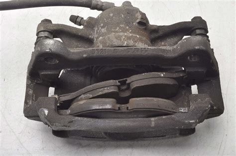 AUDI A V LIFT ZACISK HAMULCOWY LEWY PRZÓD Shrot pl