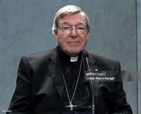 Australian Cardinal George Pell Looks On As He Makes A Statement At