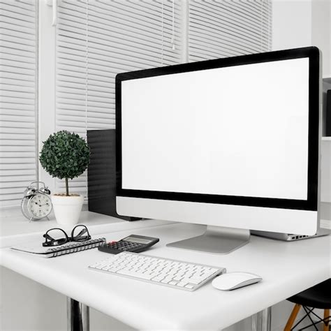 Premium Psd Office Work Desk With Cup Off Coffee Keyboard Mouse And Plants Screen Mockup