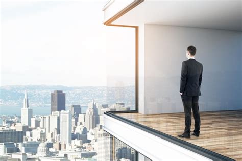 Premium Photo Businessman In Glass Office
