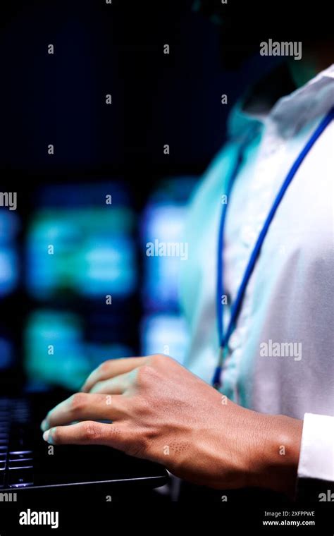 Extreme Close Up Shot Of IT Programmer Using Laptop To Run Diagnostics