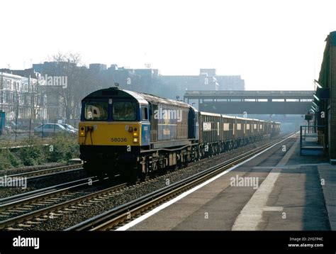 A Class 58 Diesel Locomotive Number 58036 Heads North Through A Misty