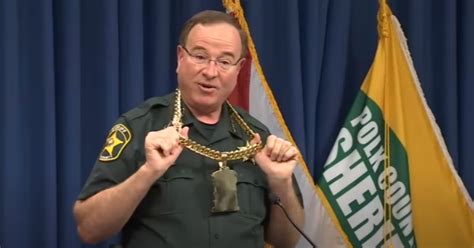 Sheriff Throws On Oversized Chain Seized In Drug Bust Raps A Few Lines