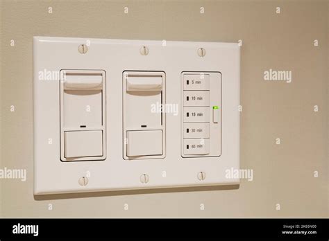 Incandescent Dimmer Lighting Wall Switches And Exhaust Fan Timer On