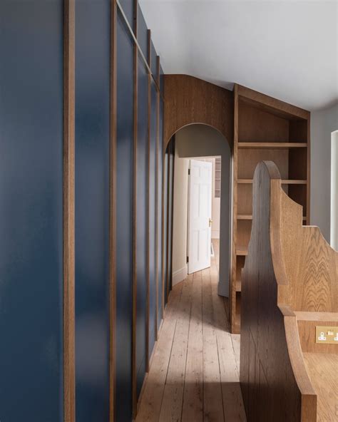 London Apartment Features Pink And Pistachio Green Storage Walls