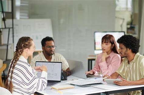 Premium Photo Team Discussing Mobile App Update