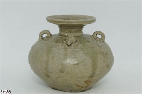 西晋越窑青釉双系盘口鸡首壶 藏家展厅 收藏资讯艺术家书画家书画名人书法家 中华收藏网