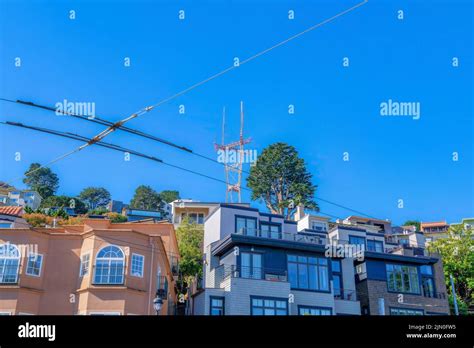 Cable Car Wires At The Front Of Residential Buildings Near The Sutro Tower In San Francisco Ca