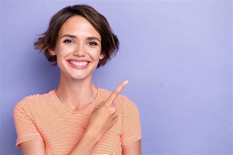 Closeup Photo Of Young Toothy Smile Woman Wear T Shirt Positive Finger Point Empty Space