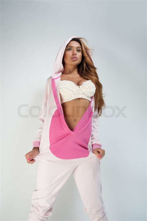 Hot Girl With Long Hair Poses In Pig Suit Stock Image Colourbox