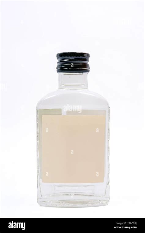 A Small Glass Bottle With A Clear Liquid A Small Bottle Of Russian