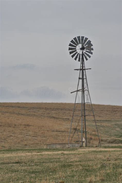 Windmills Pumping Water In The Nebraska Landscape Stock Image Image