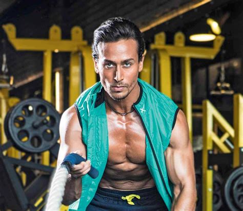 Download Tiger Shroff Body In The Gym Wallpaper