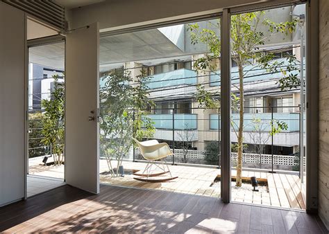 Four Storey House With Tree Lined Balconies By Ryo Matsui Architects