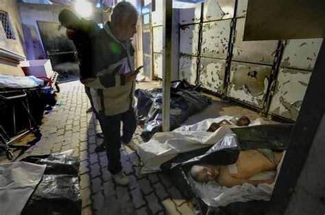 Syrians Flock To Morgues Looking For Loved Ones Who Perished In Assads