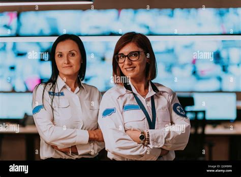 Group Portrait Of Female Security Operator While Working In A Data