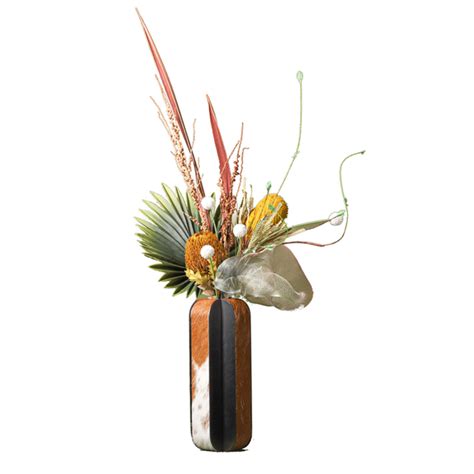 A Vase Filled With Lots Of Different Types Of Flowers