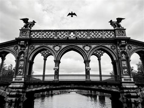 Black And White Gothic Bridge With Gargoyles Above The Supports