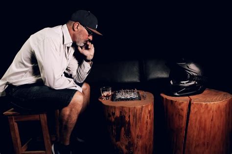 Premium Photo Man Sitting On Table
