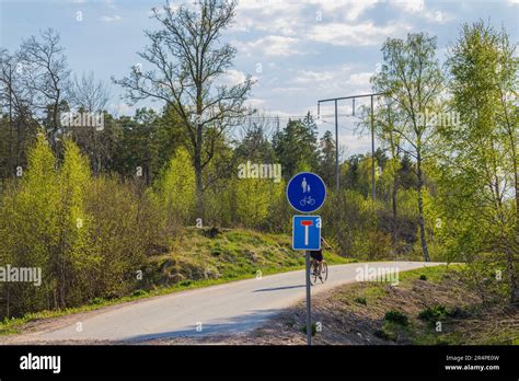 View Of Road Signs For Pedestrians And Bicycles And Warning For Dead