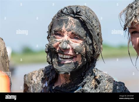 Muddy Faced Female After Taking Part In The Maldon Mud Race In Maldon