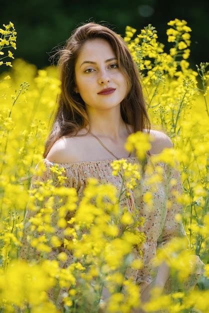 Premium Photo Portrait Of A Beautiful Young Woman Surrounded By