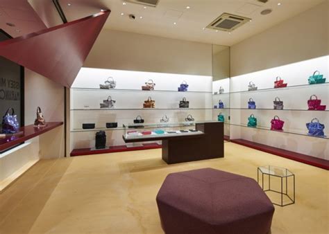 Tokujin Yoshioka Installs Red Triangles At Issey Miyake Store