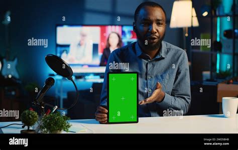 Tech Content Creator Filming Green Screen Tablet Unboxing Giving