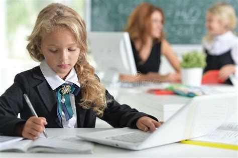 Teacher With Two Girls At Lesson Stock Image Image Of Learning