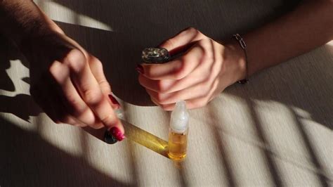 Girl Refills E Cigarette With Flavored Liquid 55357521 Stock Video At