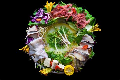 Premium Photo Korean Hot Pot With Raw Seafood On Black Background