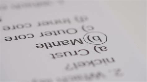 female circles correct answers in standard exam test paper with black