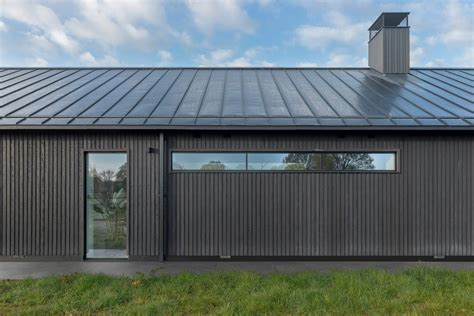 Black Timber And Metal Cloak Low Lying Weald House In Kent