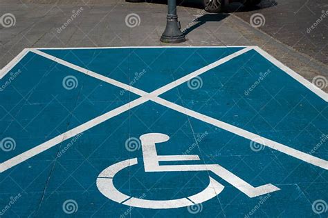 Asphalt Car Parking Lot Reserved For Handicapped Driver In Supermarket