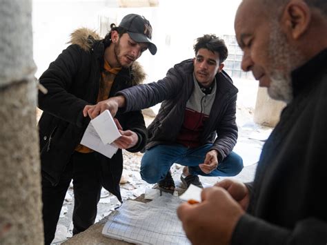 Syrian Families Scour Hospitals And Morgues For Loved Ones Lost Under