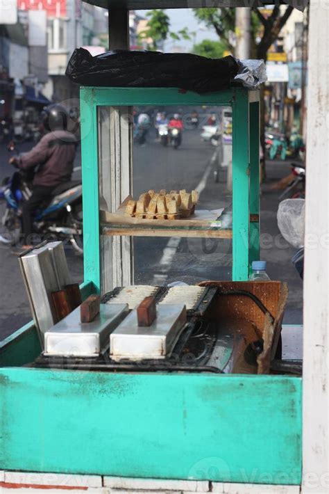 Pancong Cake Atau Kue Gandos Seller On The Roadside 14545056 Stock